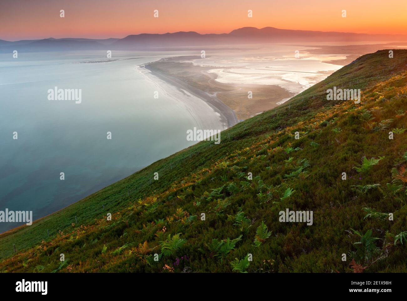 Sunrise over Rossbeigh beach on the Wild Atlantic Way on the Ring of ...