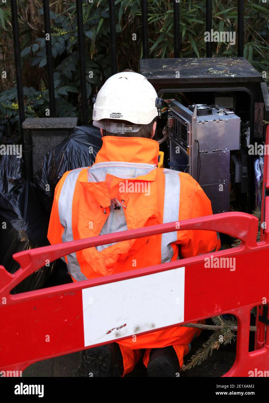 BT engineer maintaining telephone junction box in Kensington Stock ...