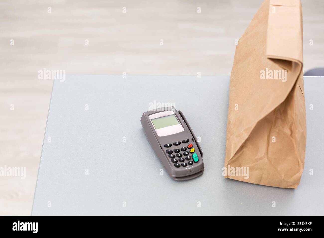 pos terminal and package delivery, parcel delivery Stock Photo - Alamy