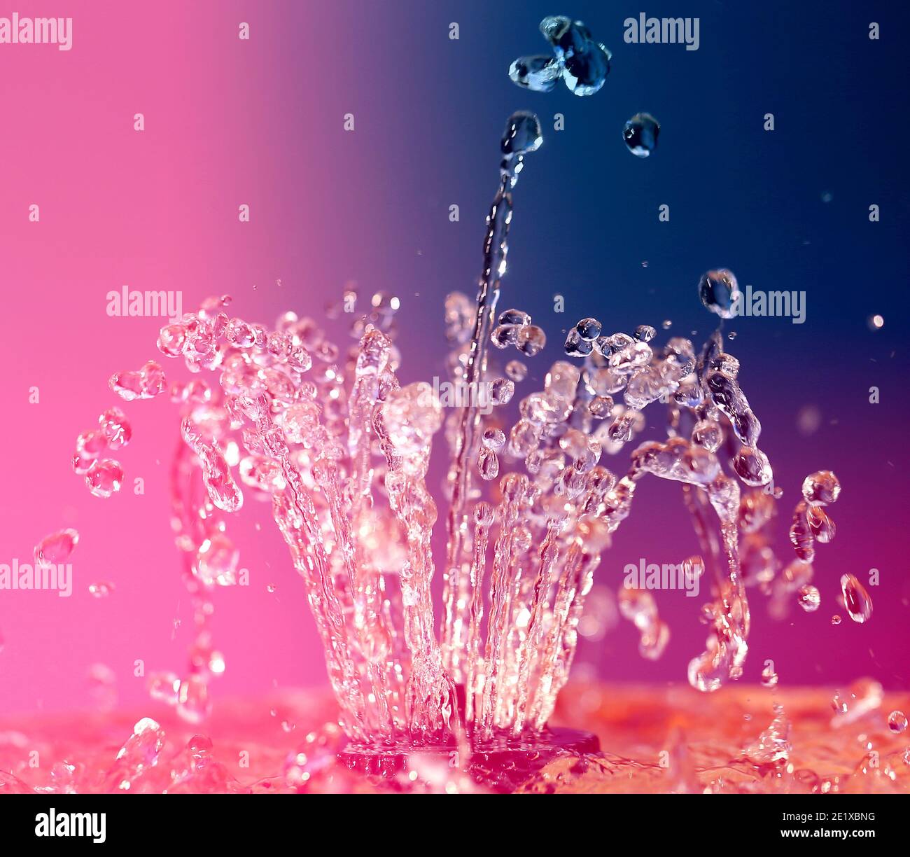 Photo of large drops of water in the fountain. Falling water drops in ...