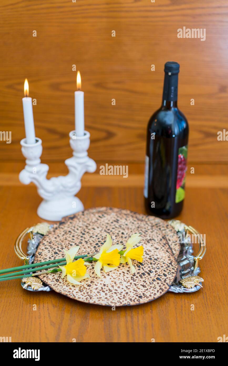 Corona Passover. Dust mask, bottle of wine and matzah - a traditional ...
