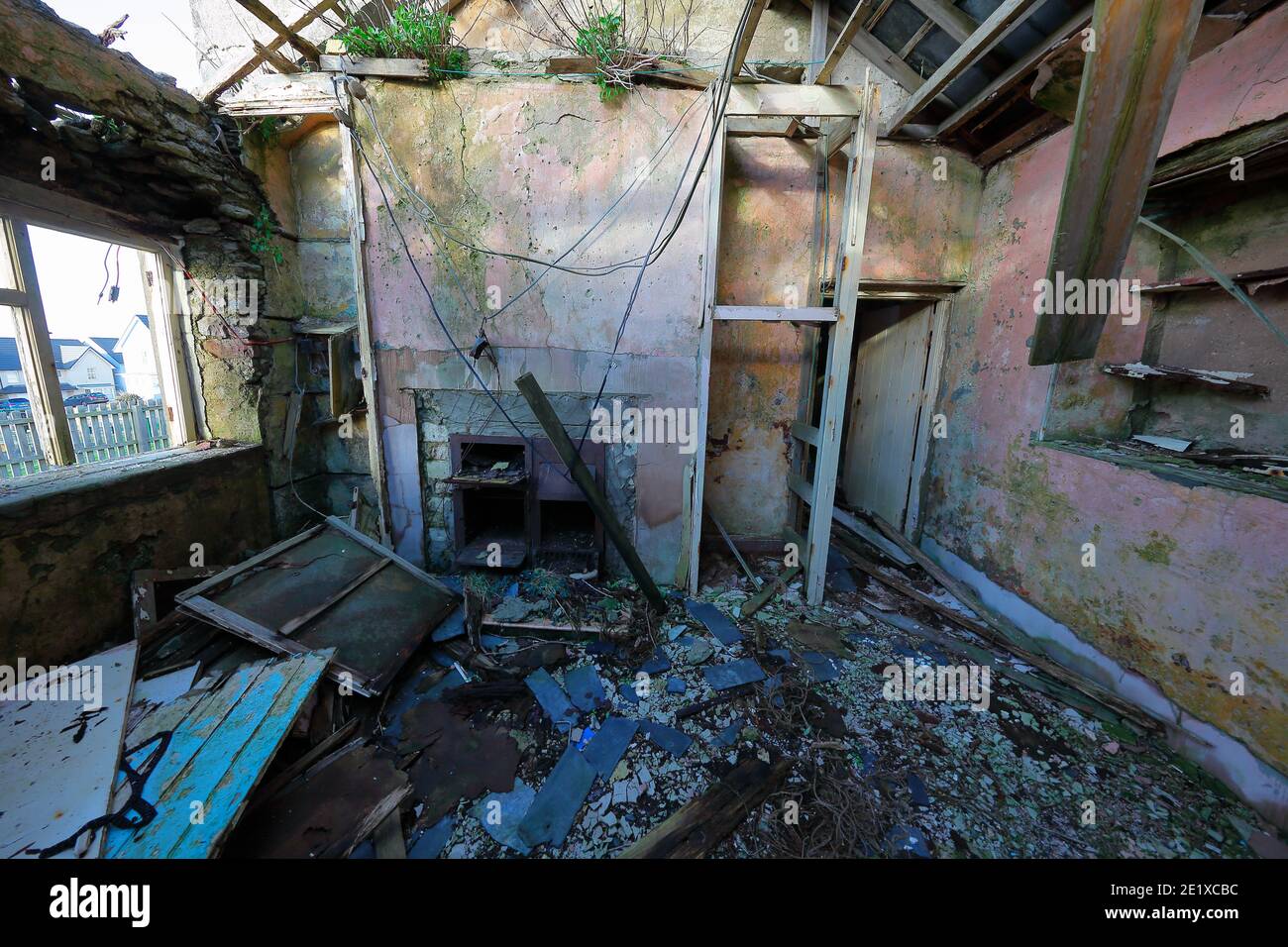 An old long since abandoned farm house in a terrible state of decay ...