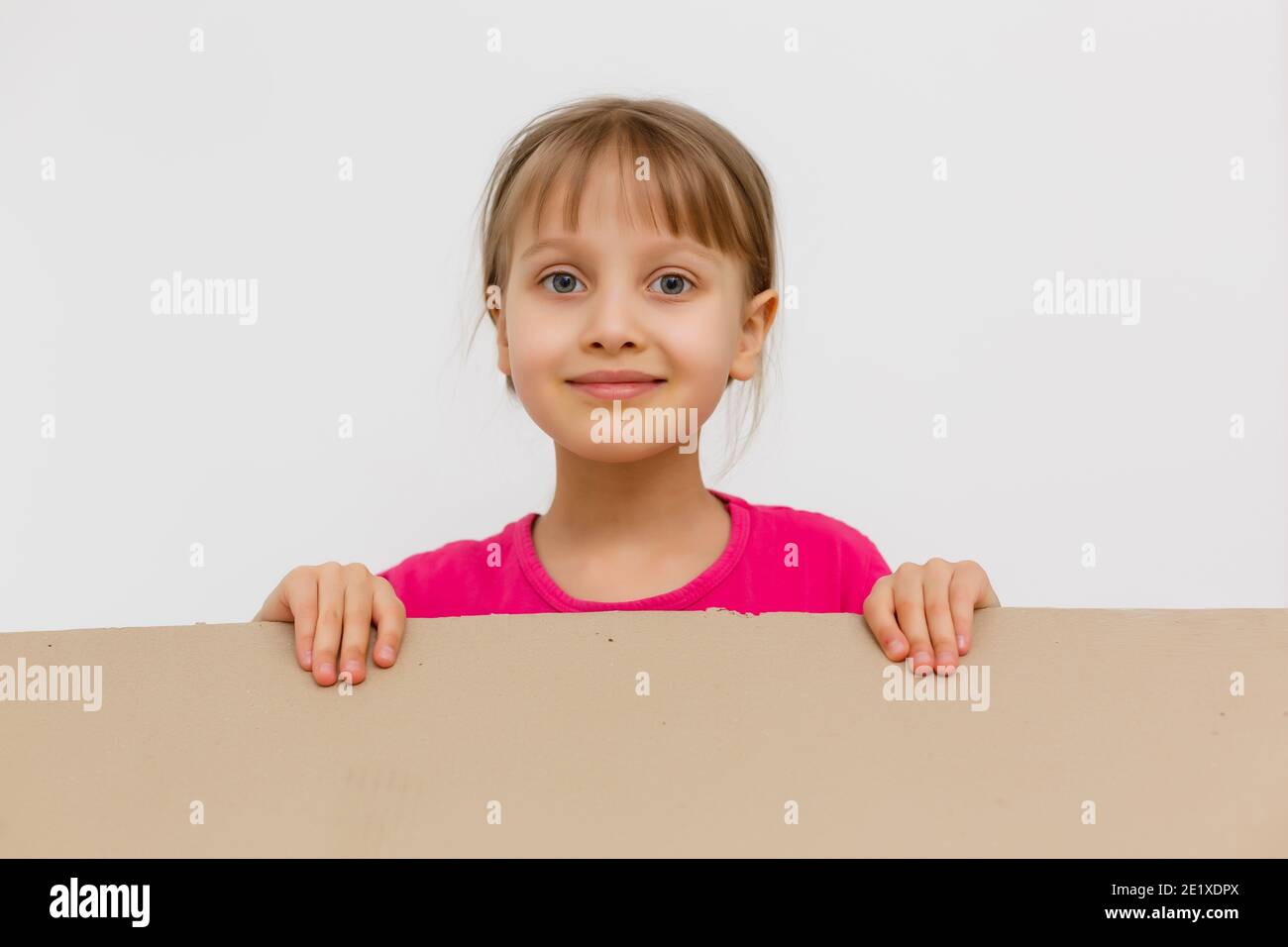 Baby girl standing in box hi-res stock photography and images - Alamy