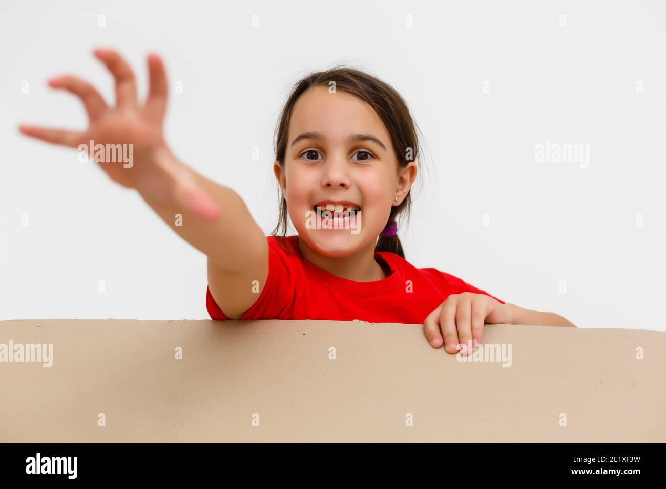 Happy girl opening present. Child excited with Christmas holiday gift ...