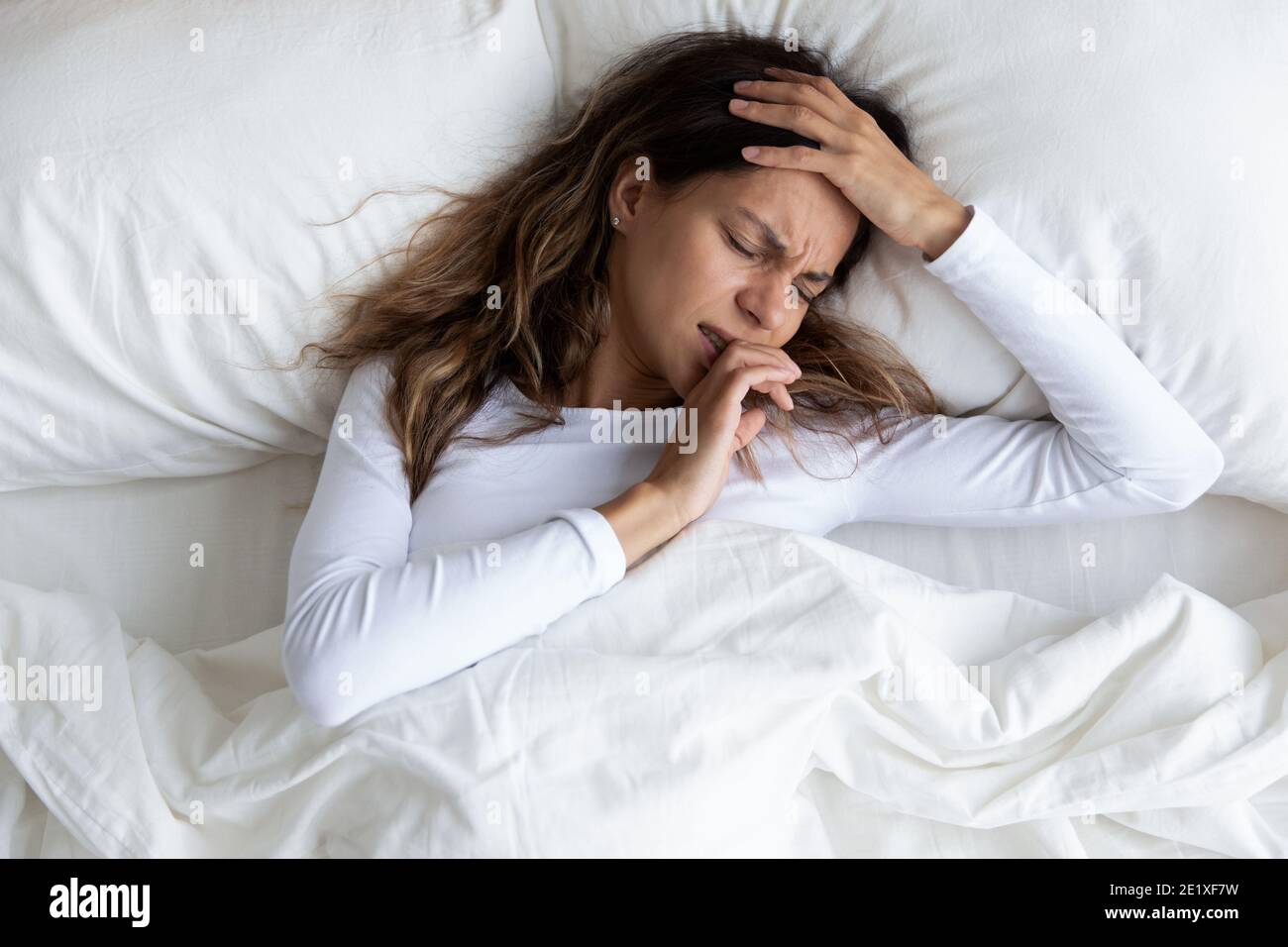 Top view unhappy woman touching forehead, suffering from headache Stock ...