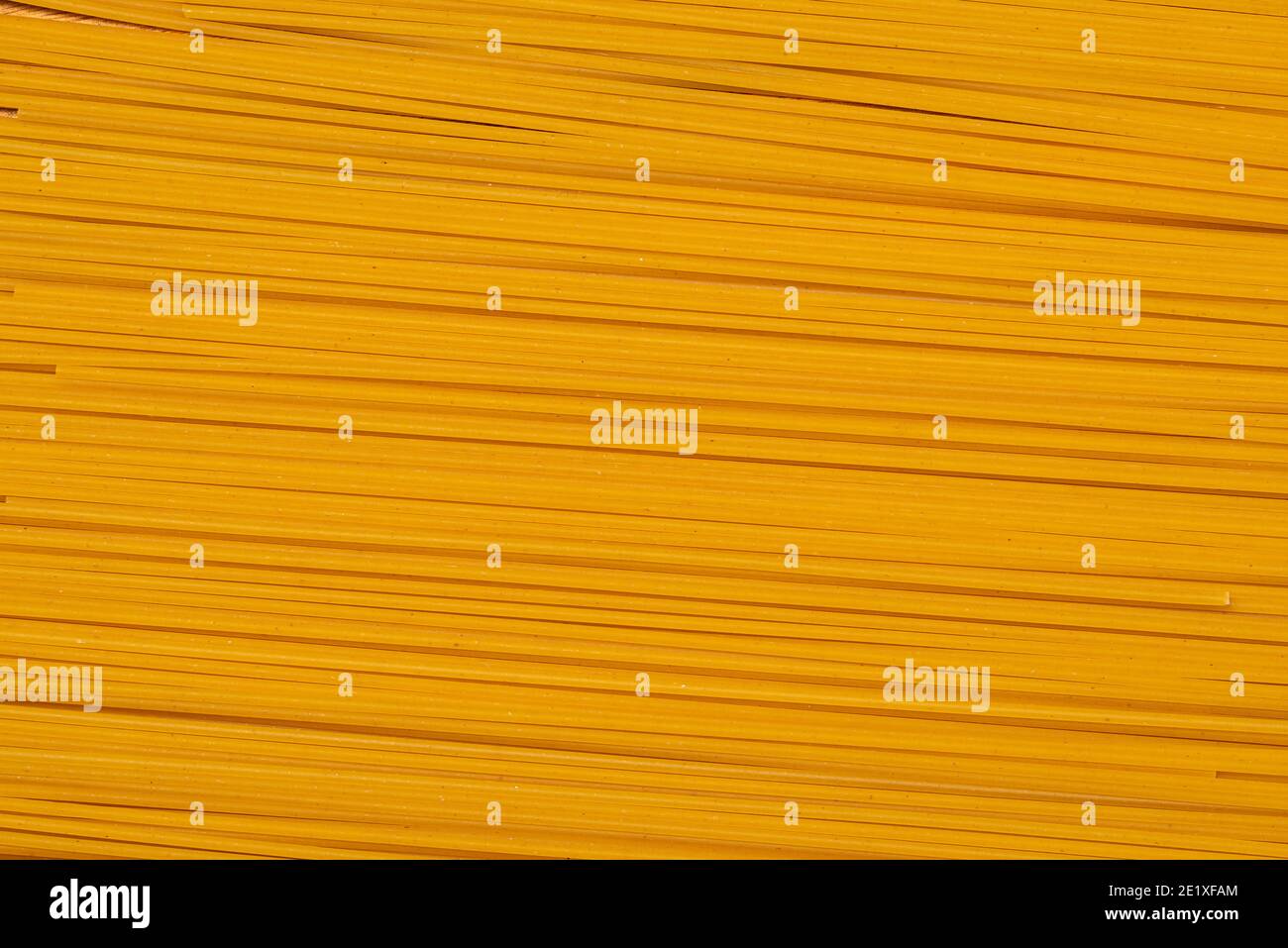 Wallpaper image of Raw Uncooked Spaghetti Noodles Stock Photo - Alamy