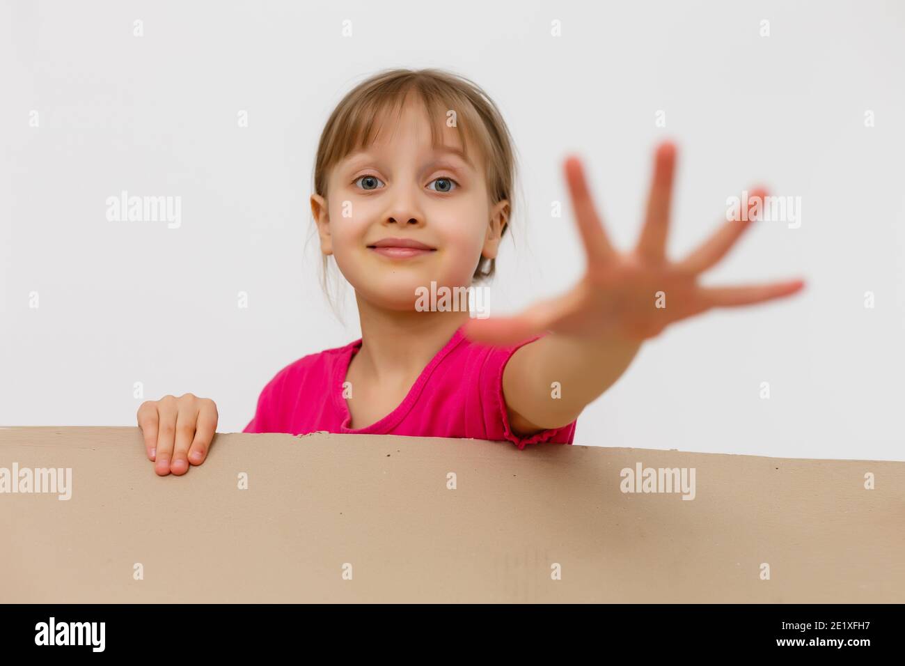 Happy girl opening present. Child excited with Christmas holiday gift ...