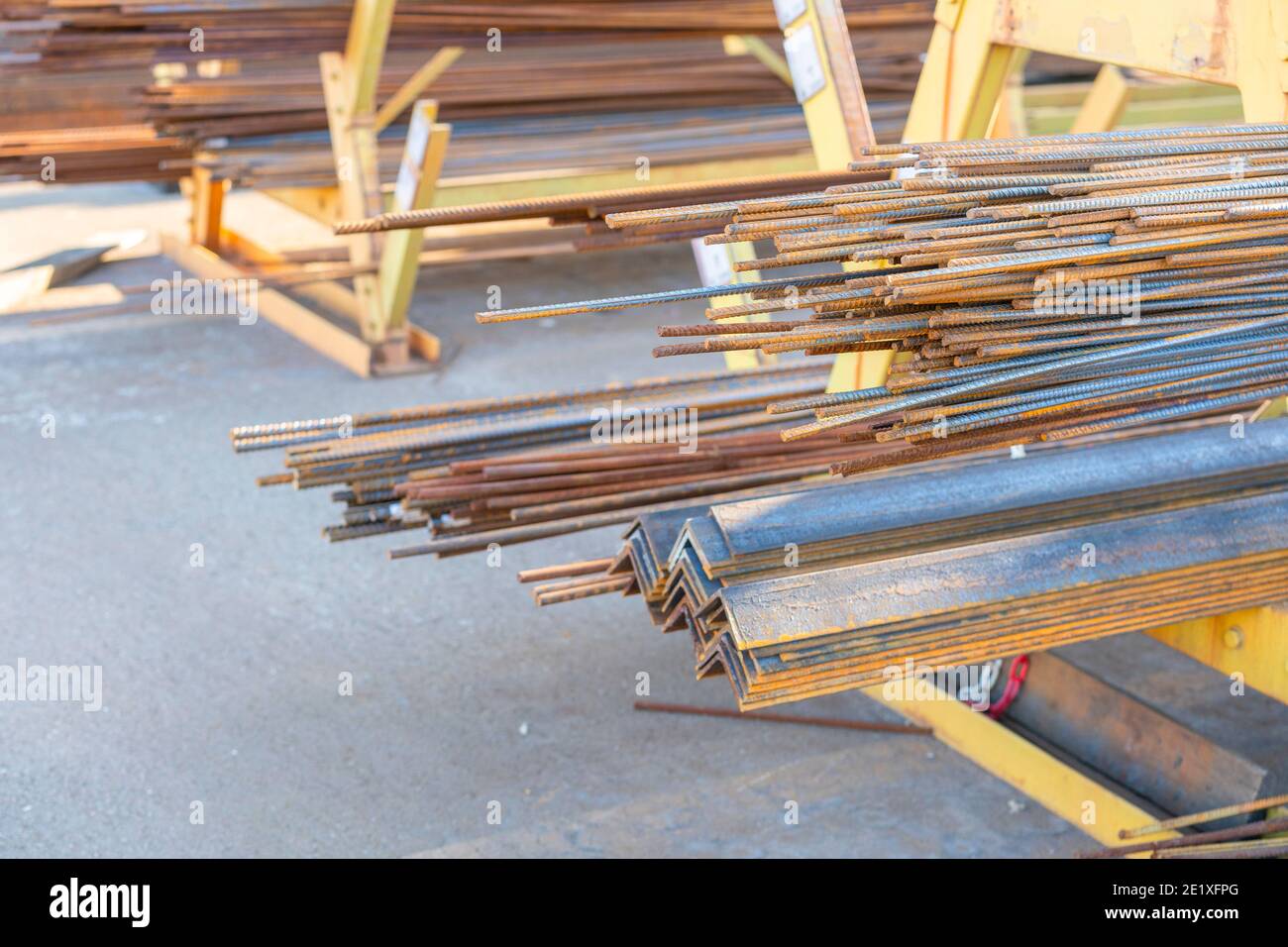 stack of steel pipe and metal beams on rack. metal pipes, profiles ...