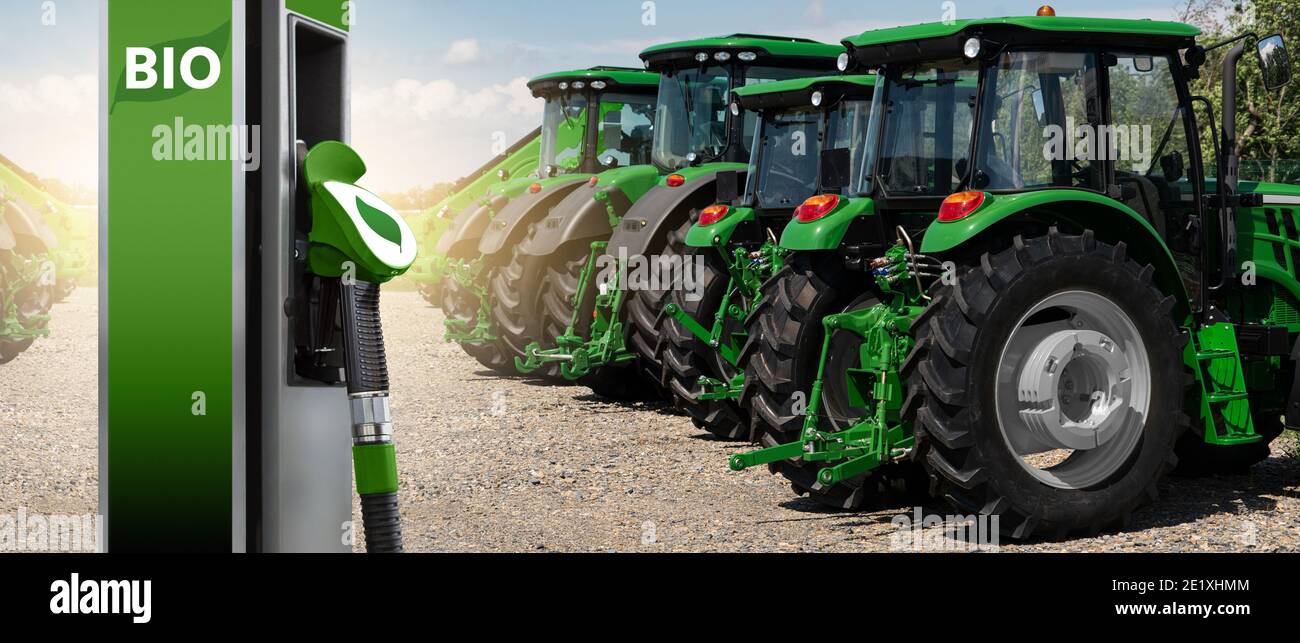 Biofuel filling station on a background of agricultural tractors Stock ...