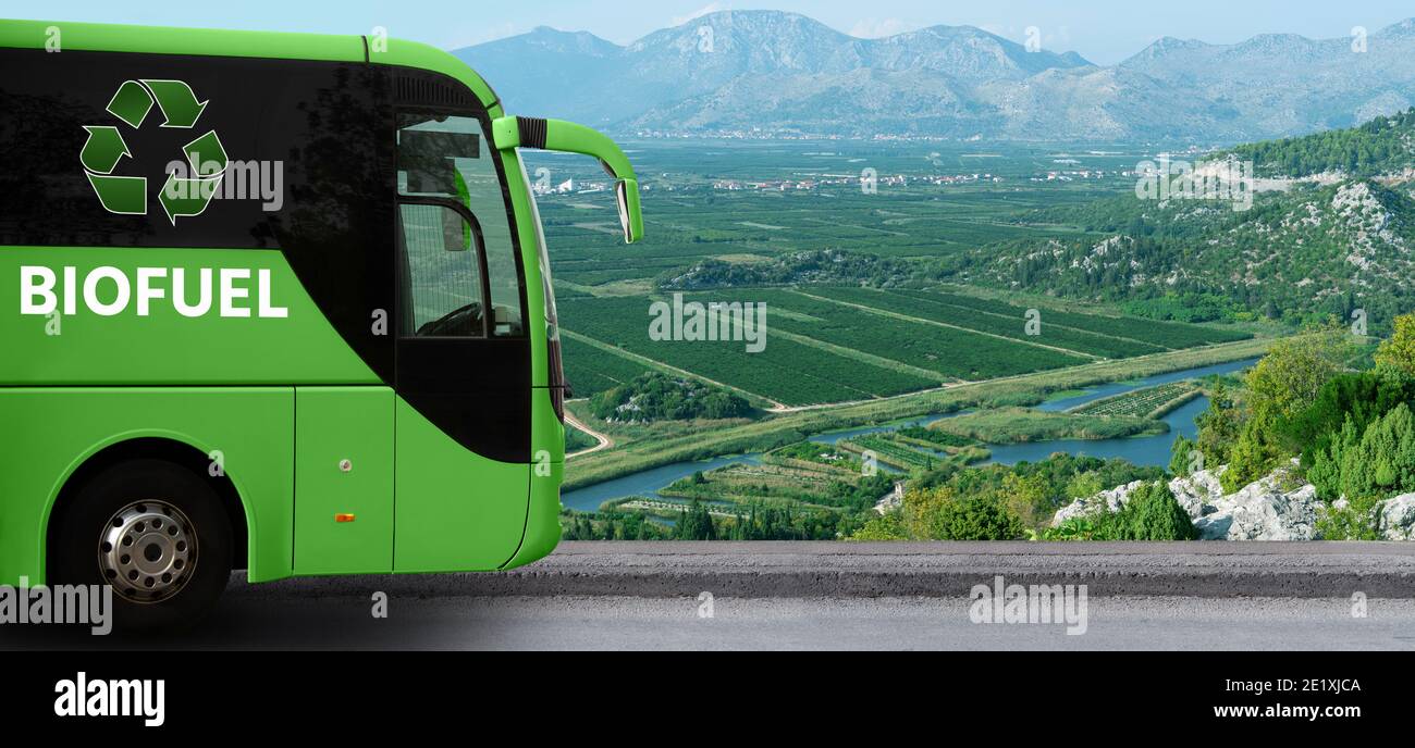 Tourist bus on biofuel on a background of green landscape Stock Photo ...