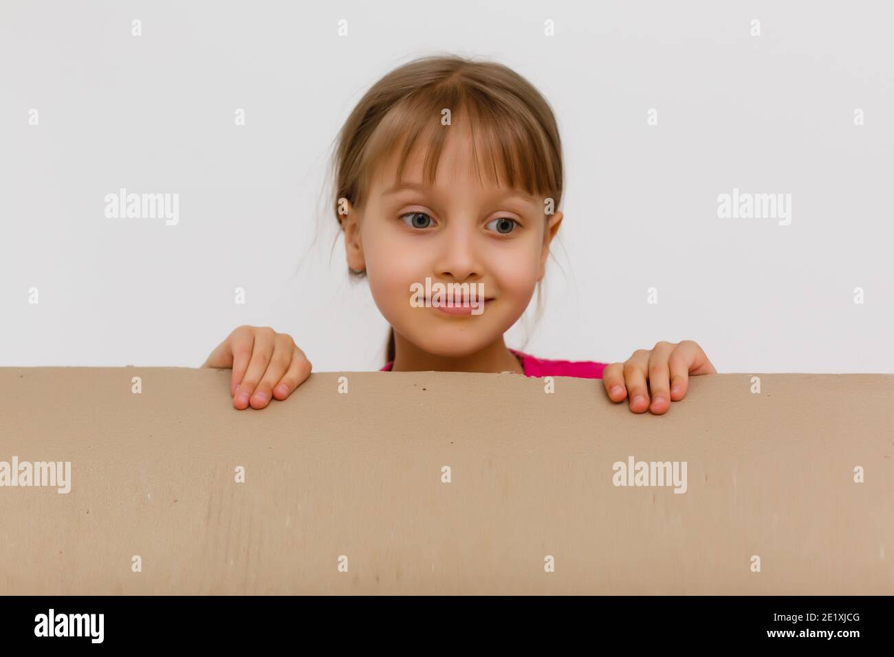 Baby girl standing in box hi-res stock photography and images - Alamy