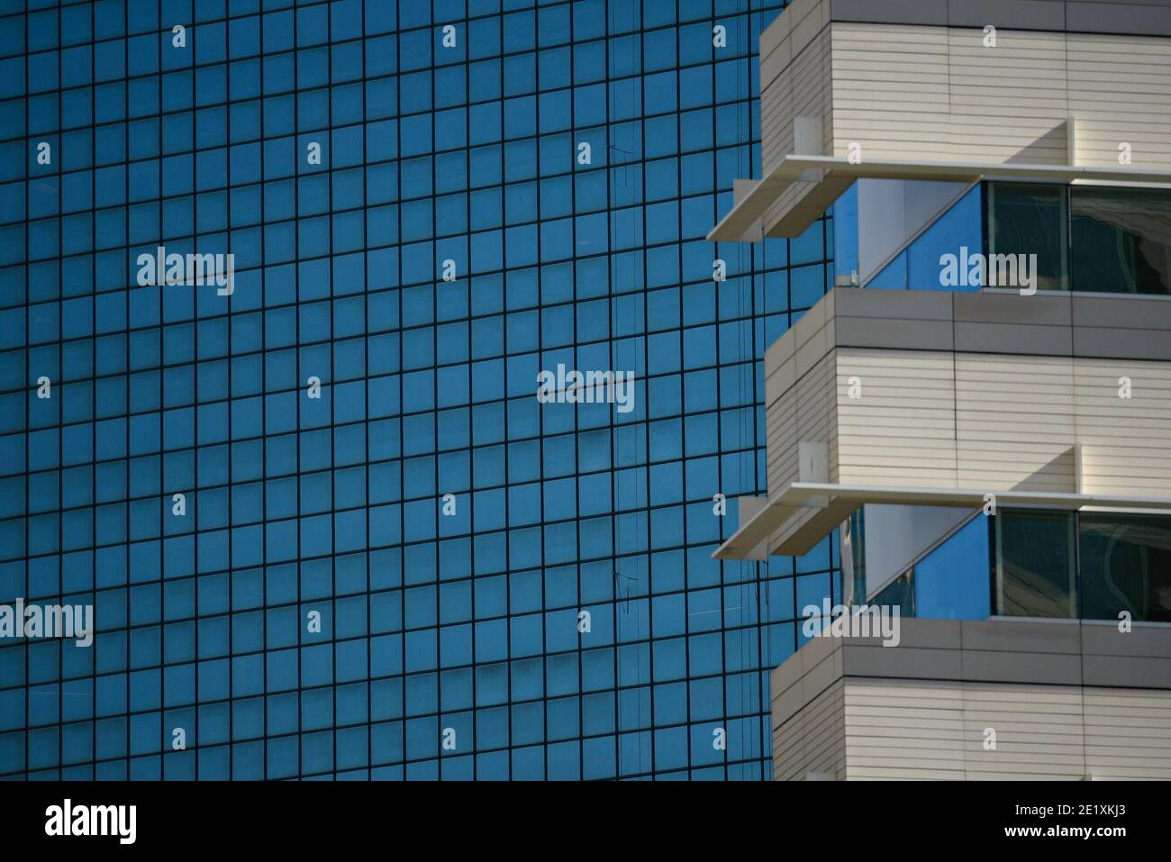 Modern design commercial high-rise building glass facade in downtown ...