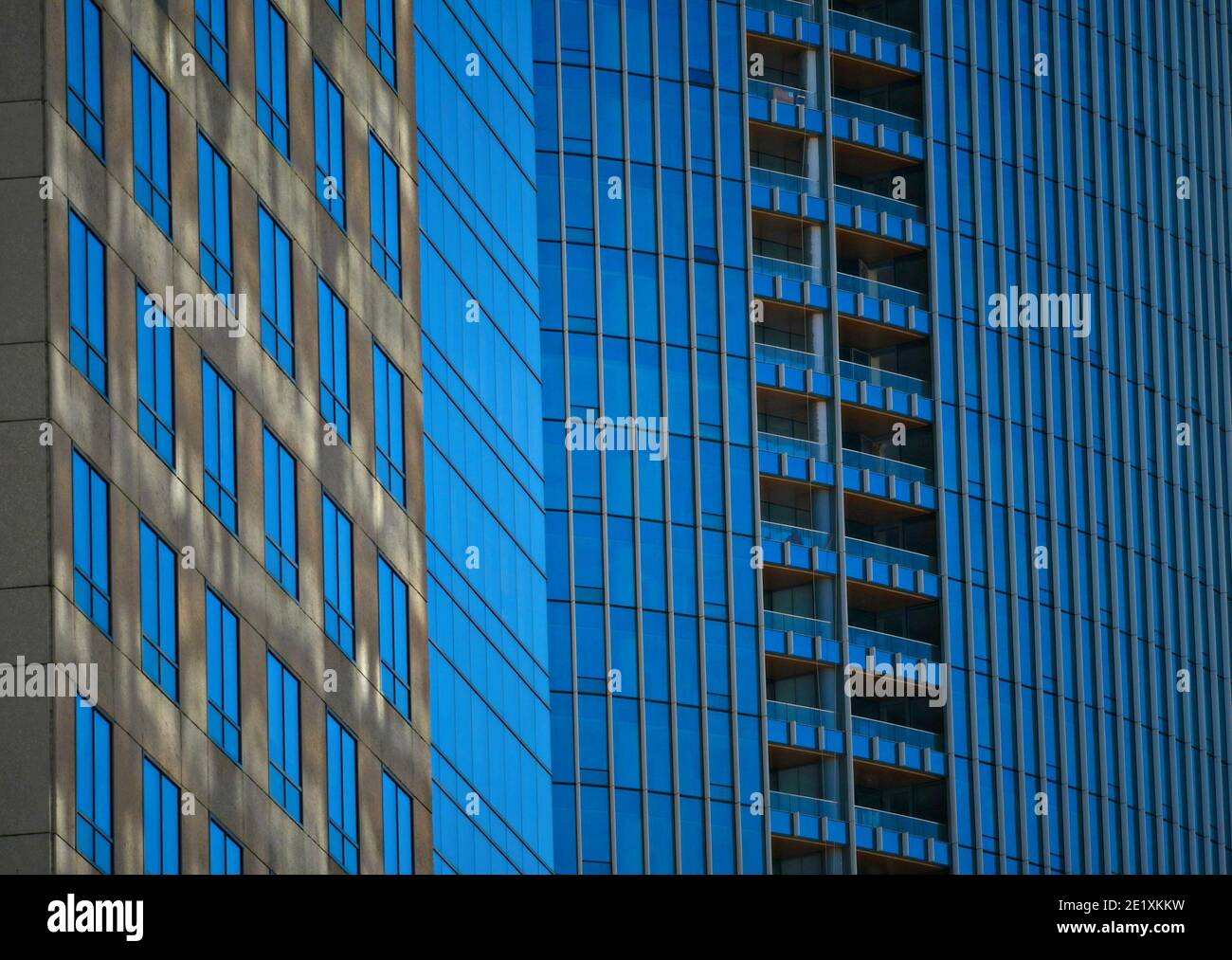 Corporate offices high-rise building blue glass facade in the San Diego ...