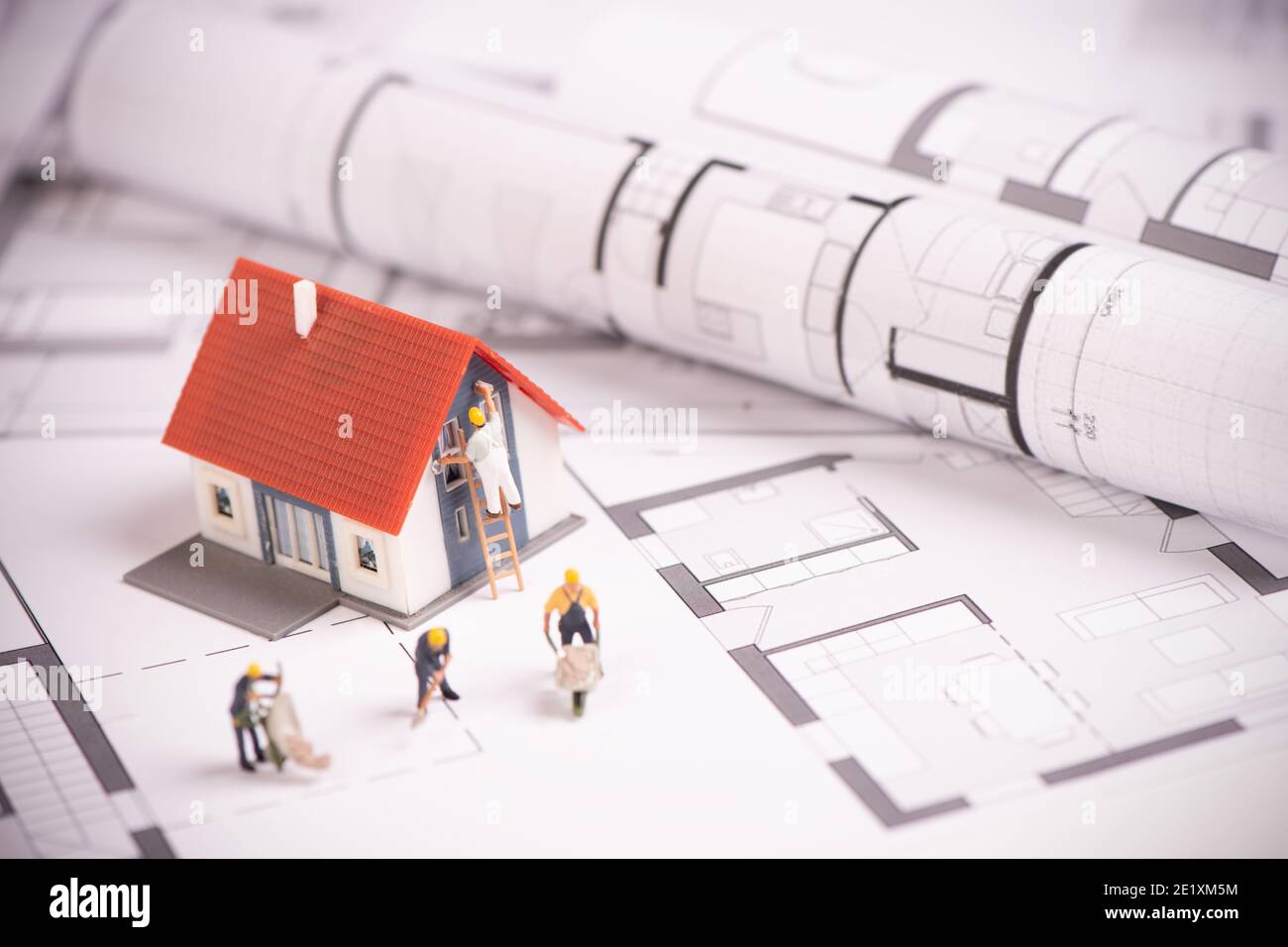 New model house on architecture blueprint plan close up Stock Photo - Alamy