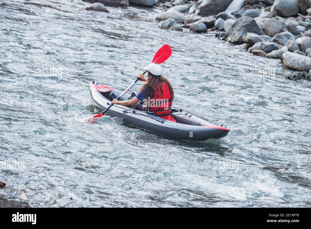 Girl on inflatable boat hi-res stock photography and images - Alamy