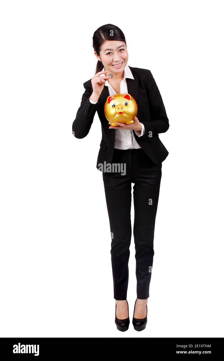 A Busines swoman holding a piggy bank high quality photo Stock Photo ...