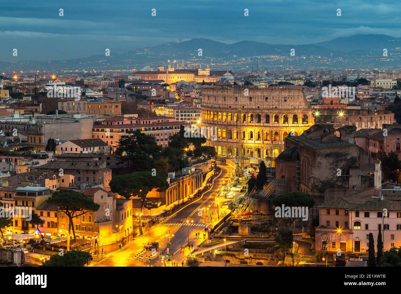 Panoramic aerial view of Colosseum in a summer night in Rome, Italy ...