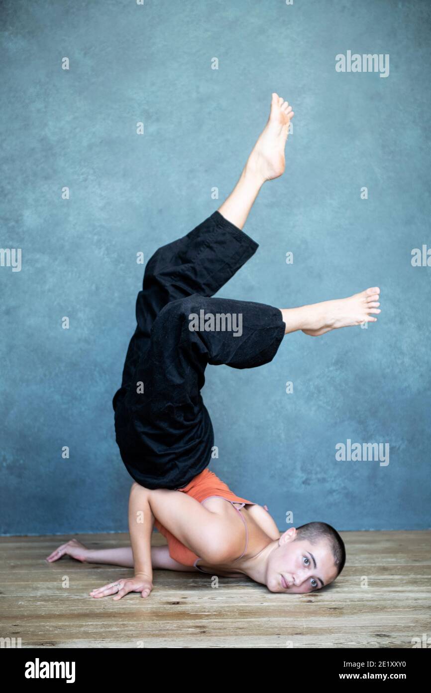 Non-binary, gender neutral, biological female with shaved head in ...