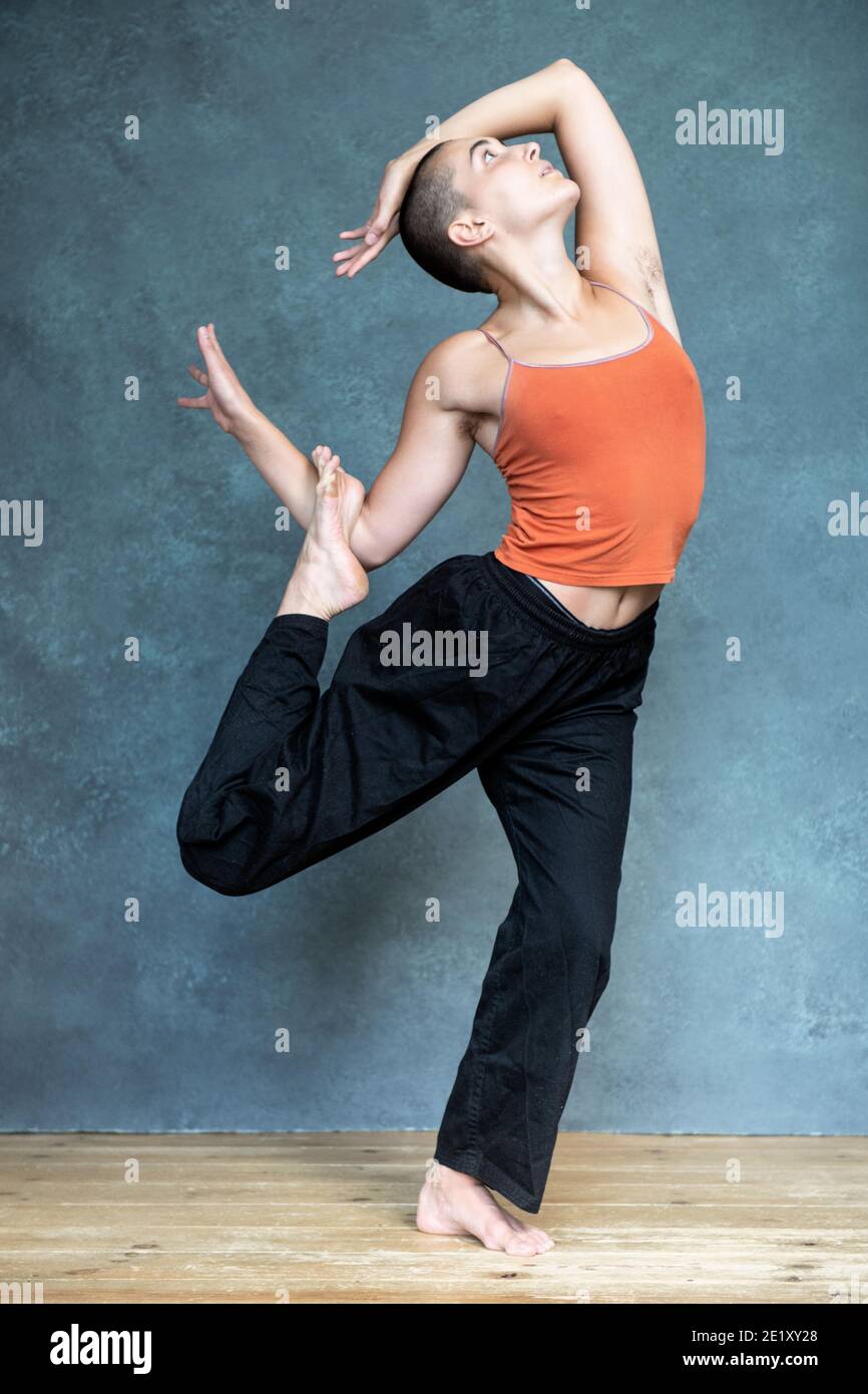 Non-binary, gender neutral, biological female with shaved head in ...