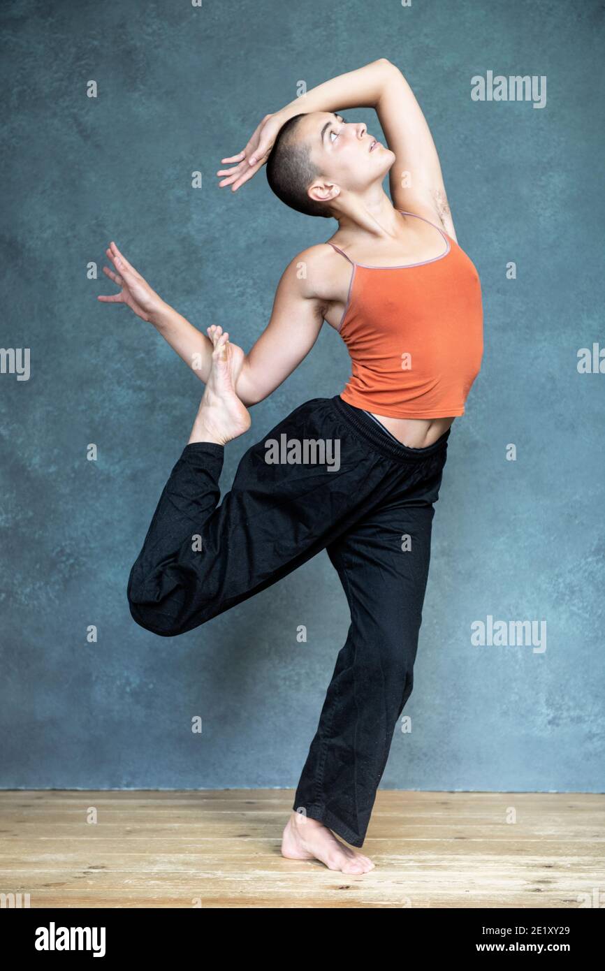 Non-binary, gender neutral, biological female with shaved head in ...