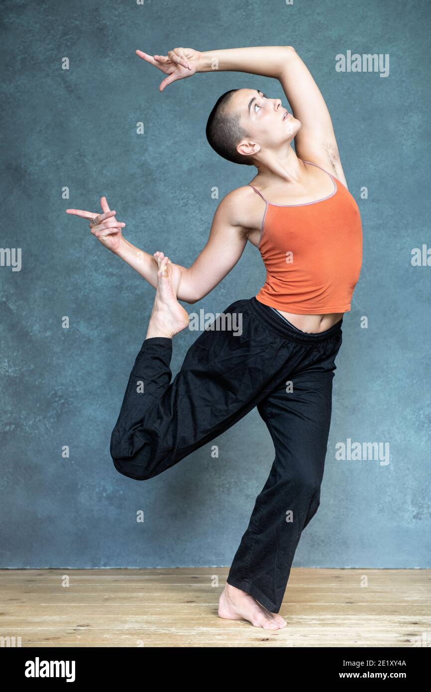 Non-binary, gender neutral, biological female with shaved head in ...