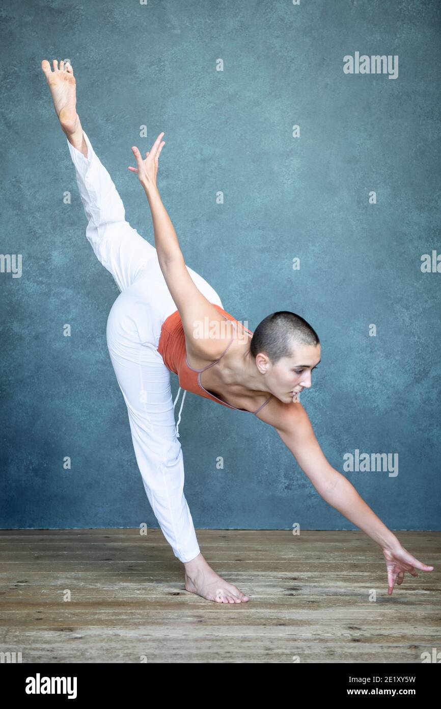 Non-binary, gender neutral, biological female with shaved head in ...