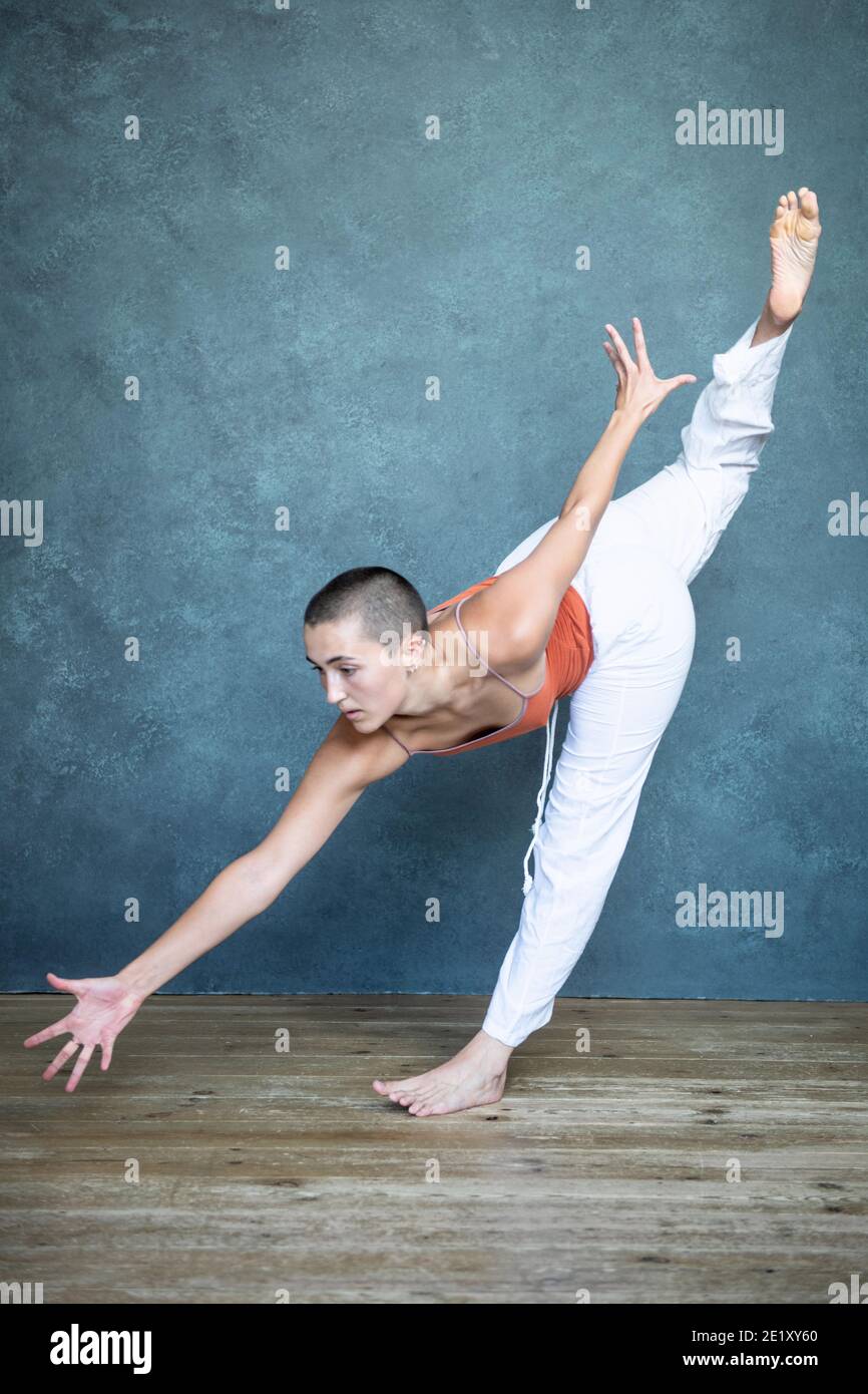 Non-binary, gender neutral, biological female with shaved head in ...