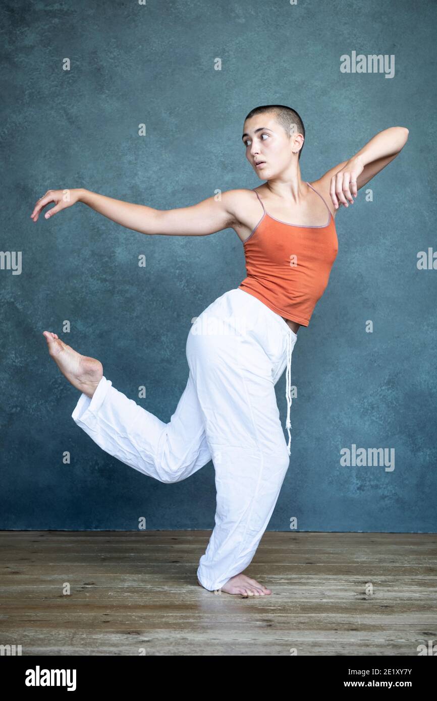 Non-binary, gender neutral, biological female with shaved head in ...