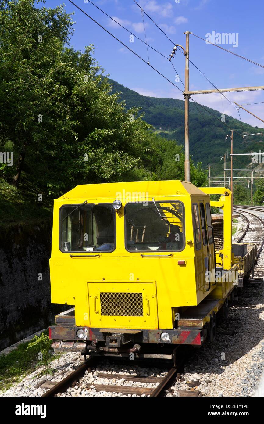 yellow railway maintenance train Stock Photo - Alamy