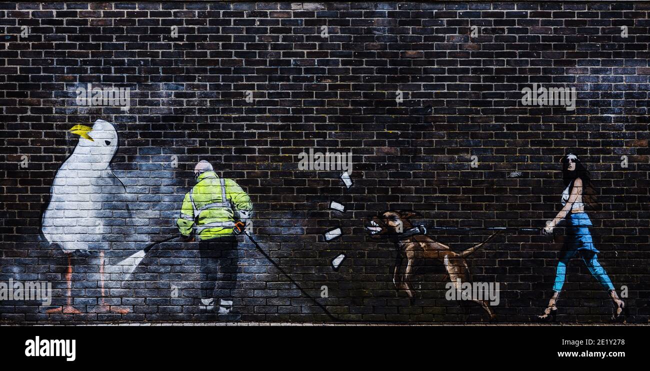 Man cleaning graffiti hi-res stock photography and images - Alamy