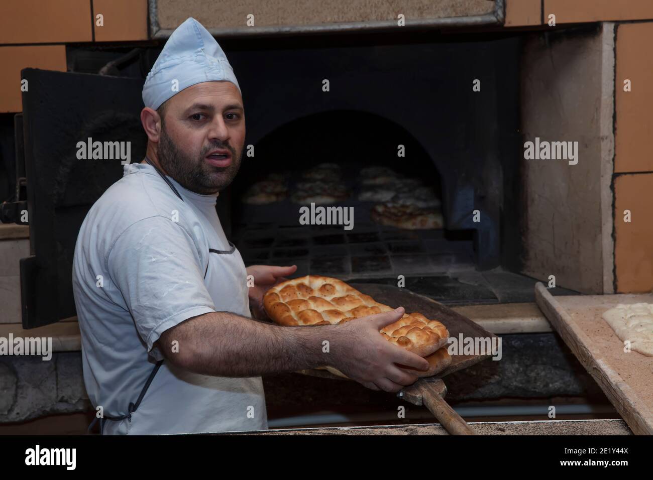 Daily production of bread baked with wood oven with traditional method ...