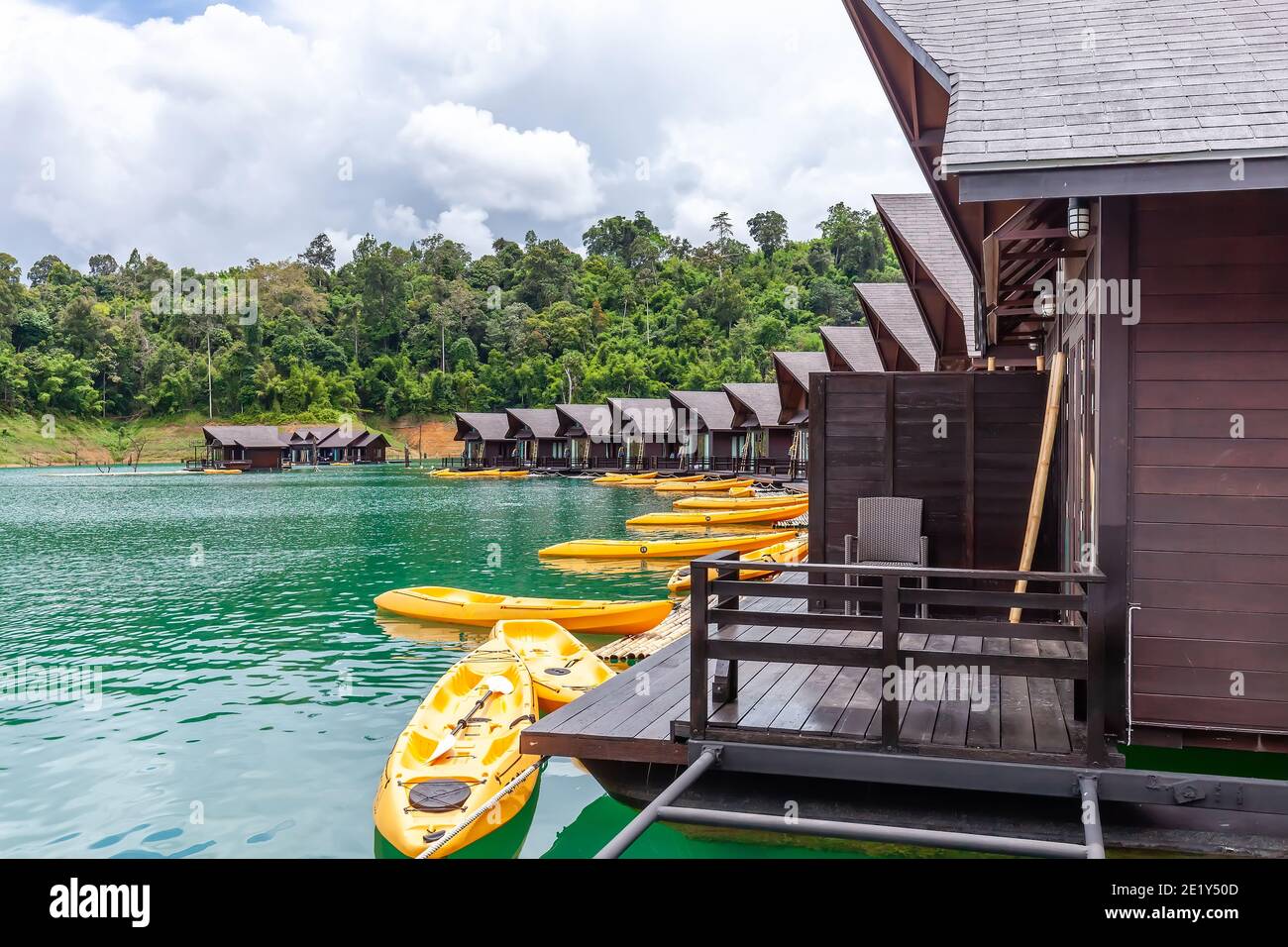 Luxury Resort with Floating Raft Houses on Green Lake with Tropical ...