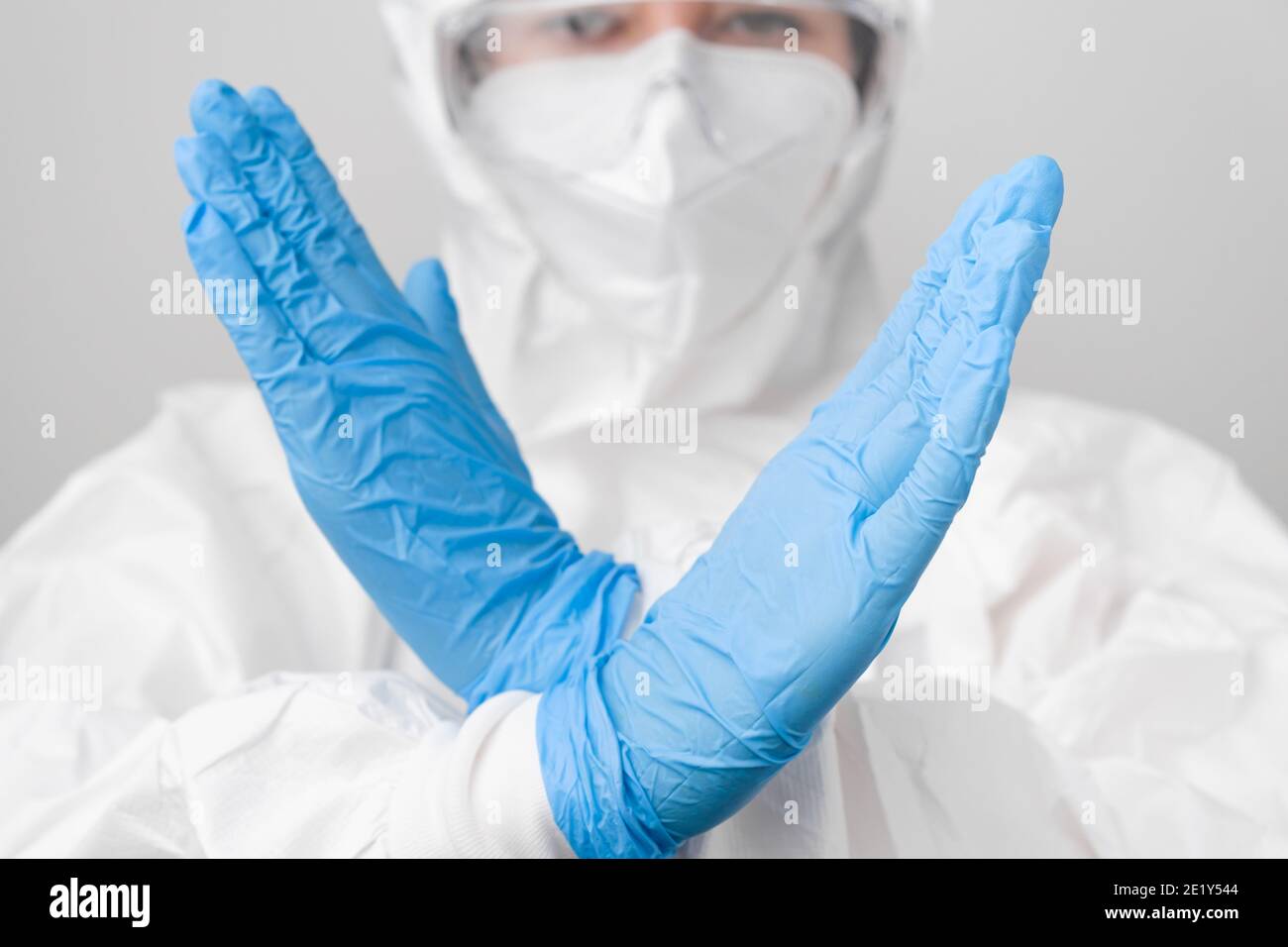 Doctor in a biohazard protective PPE suit and protective face mask ...