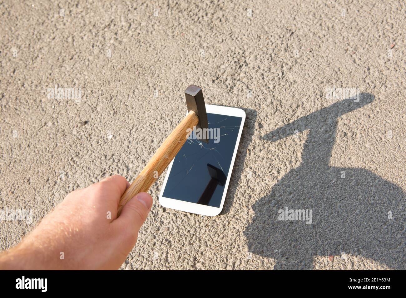 hammer smashing the screen of a smartphone Stock Photo - Alamy