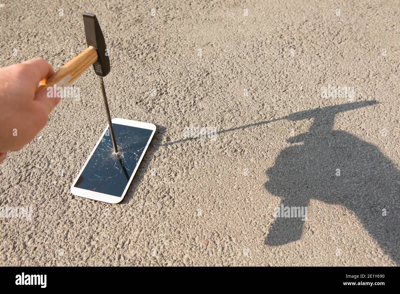 hammer smashing the screen of a smartphone Stock Photo - Alamy