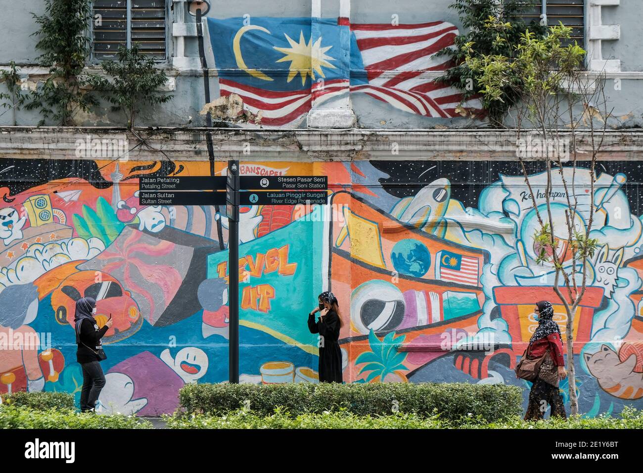 People wearing face masks as a precaution against the spread of Covid ...