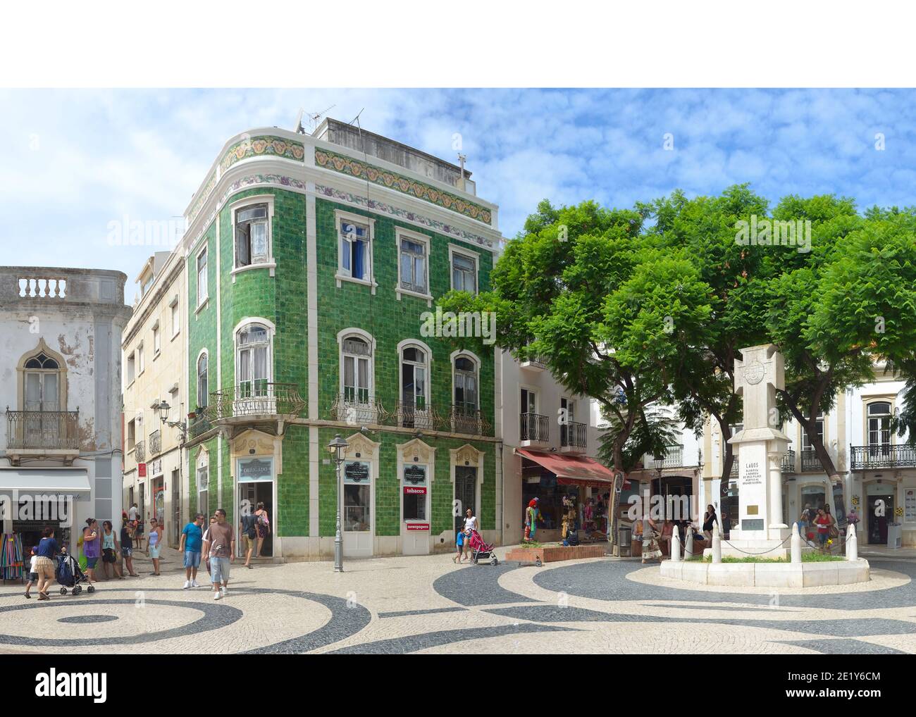 Historic architecture of Lagos old town square with shoppers and ...