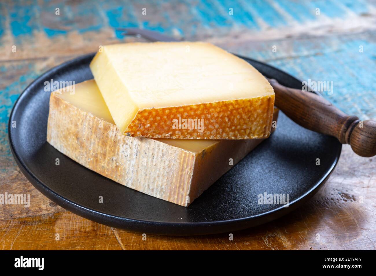 Cheese collection, French comte and Swiss gruyere cheeses close up ...