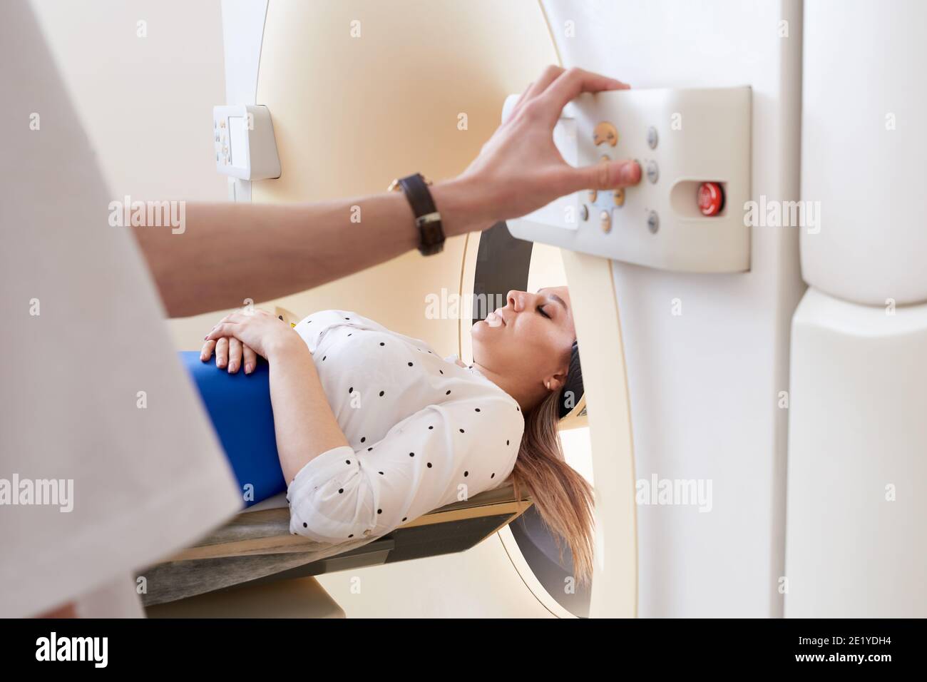 Female patient undergoing MRI - Magnetic resonance imaging in Hospital ...