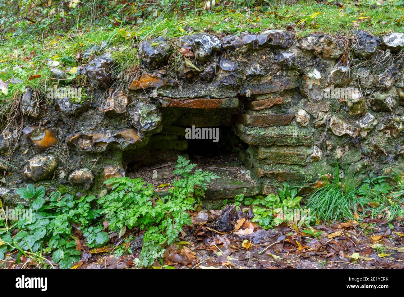 Detail showing a possible drainage outlet/opening at the base of the ...
