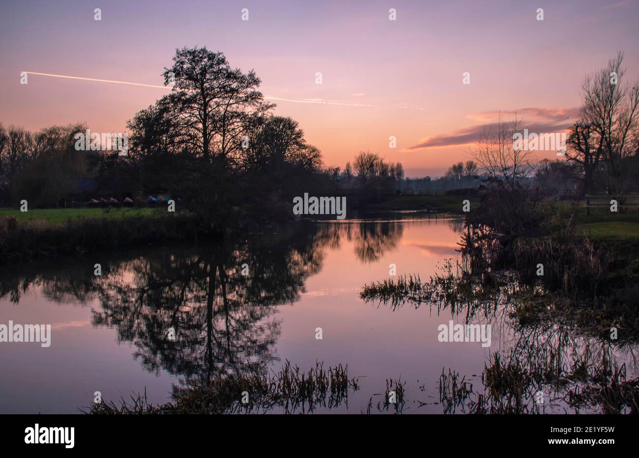 A winter sunset over the River Stour in Dedham in Essex, UK Stock Photo ...