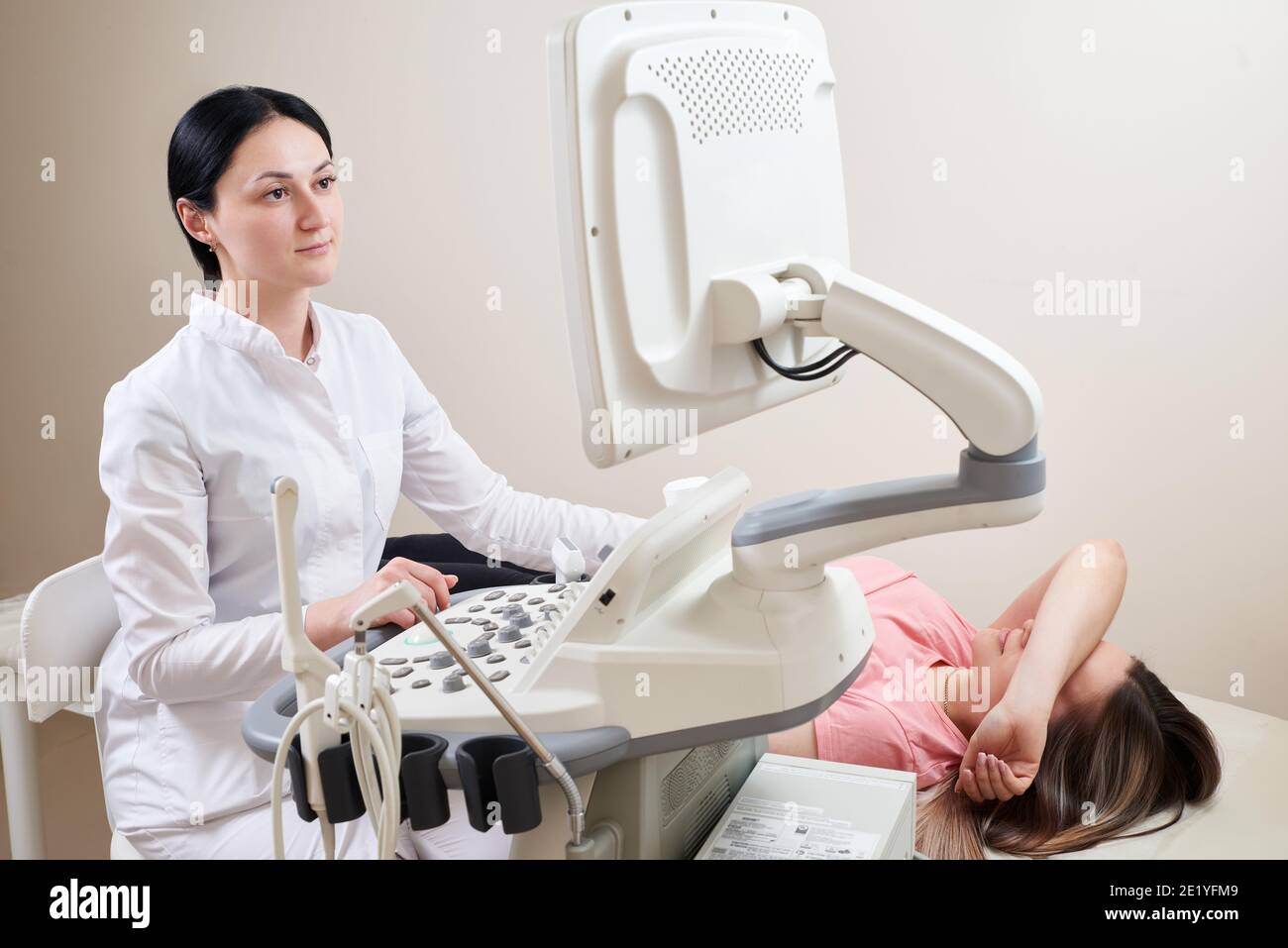 Gynecologist doing ultrasound scan in modern clinic Stock Photo - Alamy