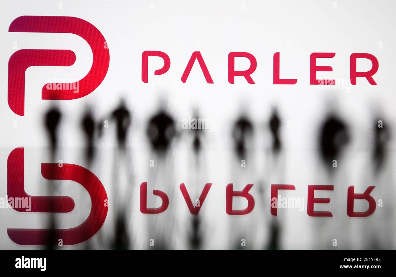 In this photo illustration the Parler logo seen in front of the ...