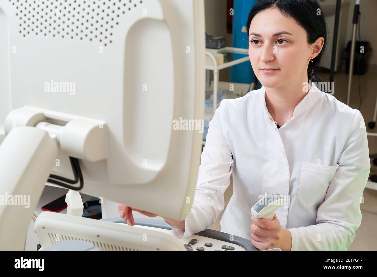 Gynecologist doing ultrasound scan in modern clinic Stock Photo - Alamy