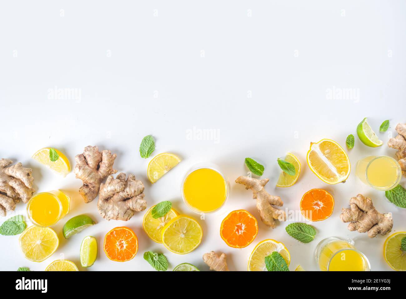 Immunity booster drink ingredients. Homemade ginger and citrus juice or ...