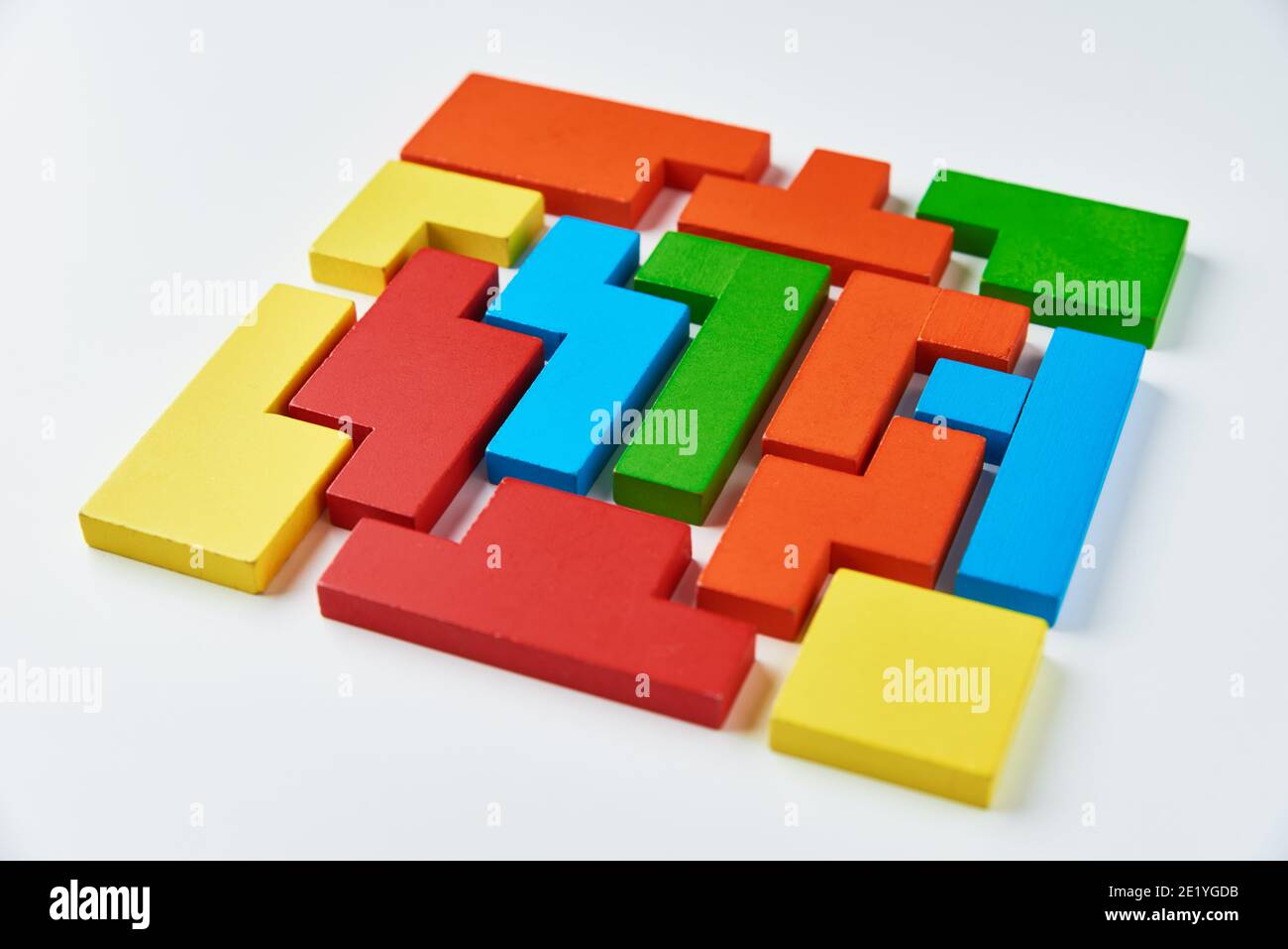 Logical thinking concept. Different shapes colorful wooden blocks on a ...