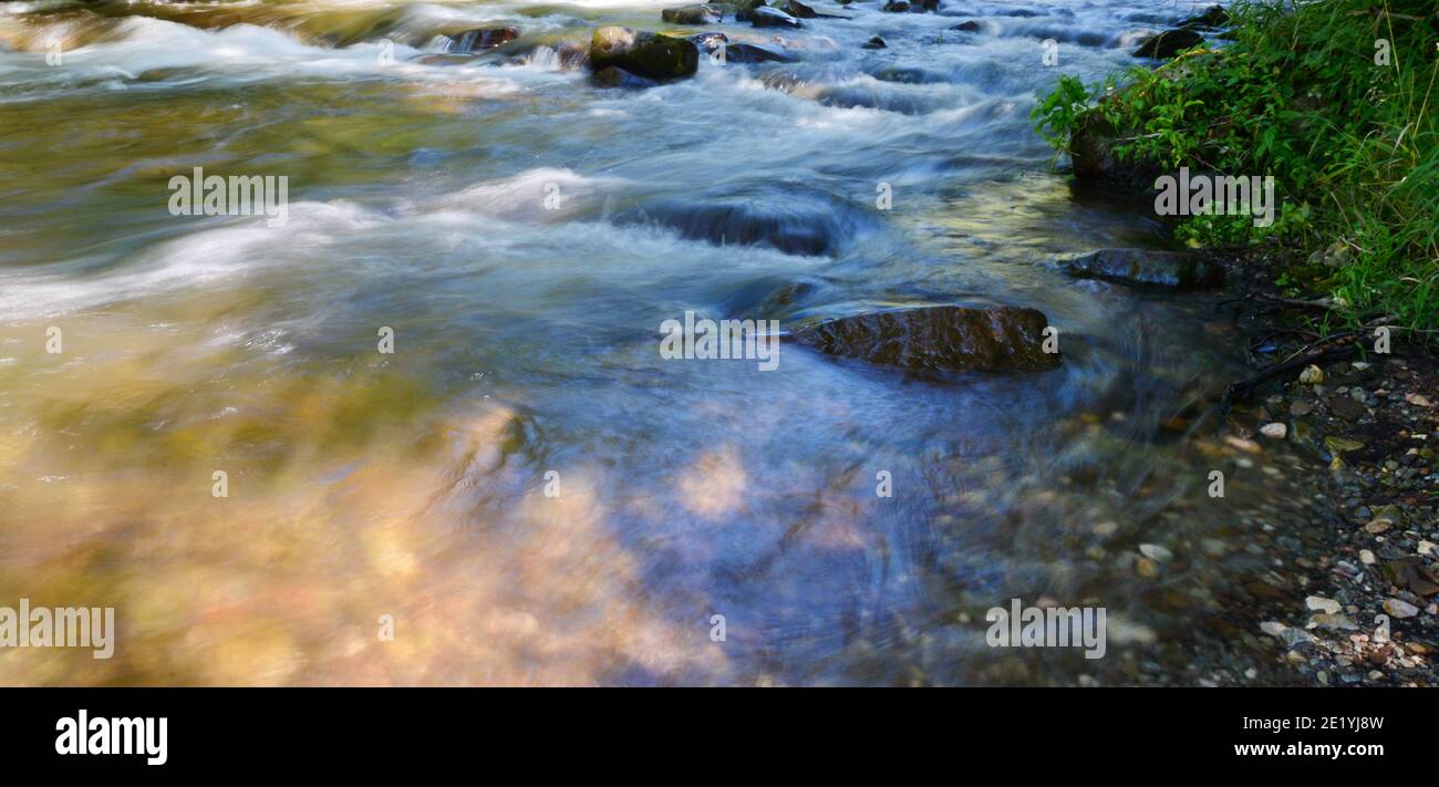 River in motion. nature background. Milky blue glacial water Stock Photo - Alamy