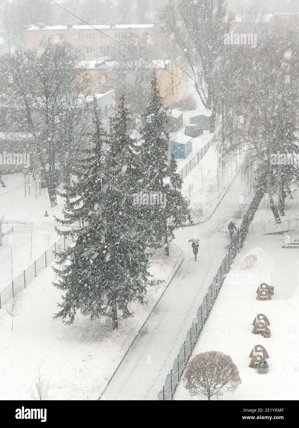Winter landscape. The streets of a small town are covered with white ...
