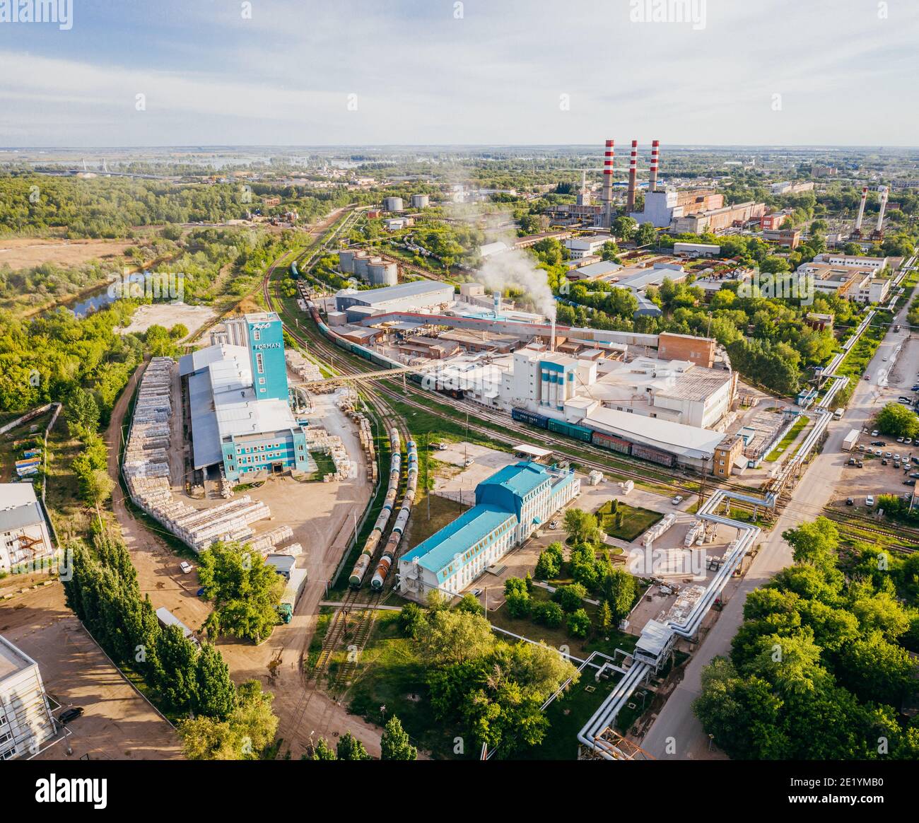 Industrial zone with warehouses and distributions centers, many tracks ...