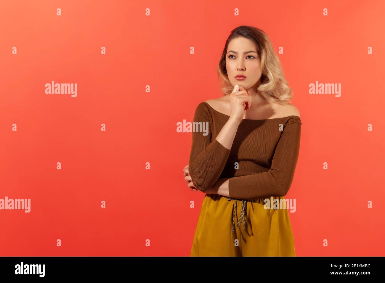 Woman pondering a question hi-res stock photography and images - Alamy